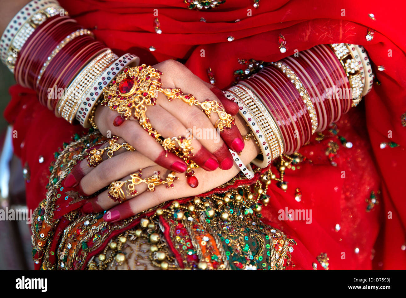 Mid section view of an Indian bride in traditional wedding dress Stock ...