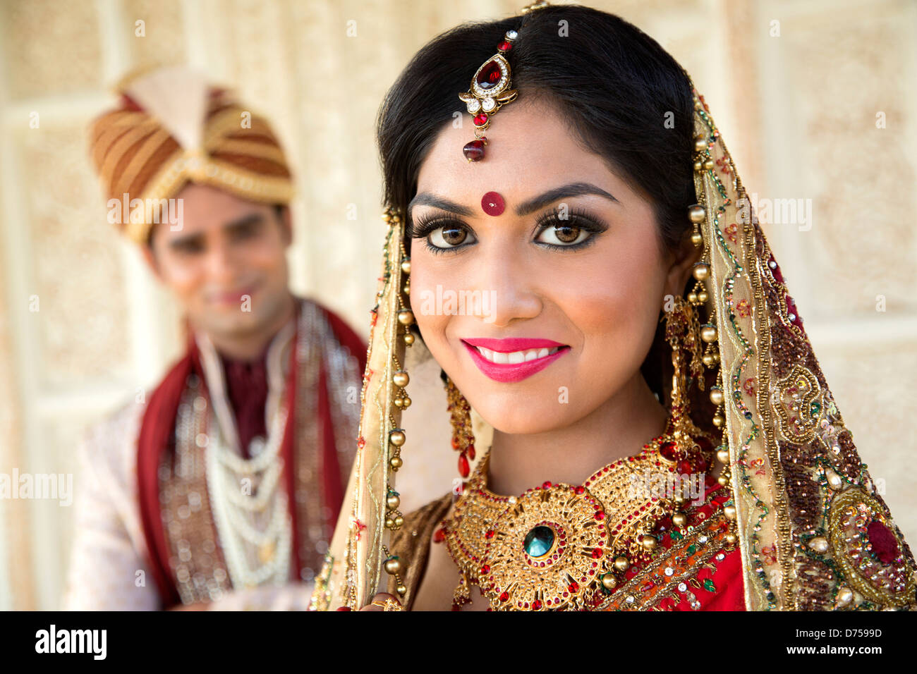 Indian bride standing smiling hi-res stock photography and images - Alamy