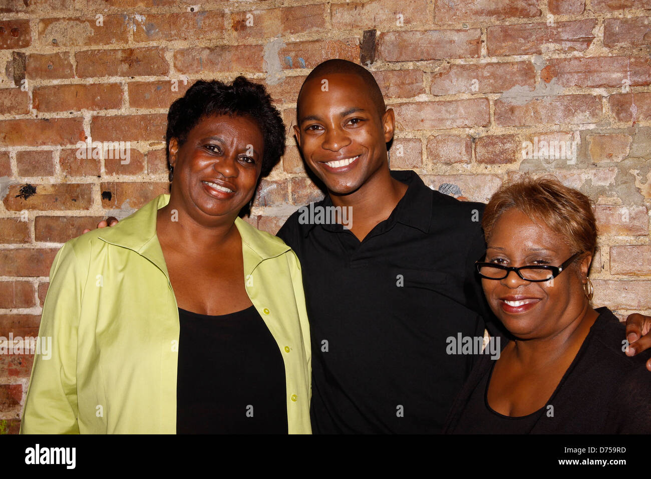 Director Reginald L. Douglas and his family Justin Bartha visits the ...