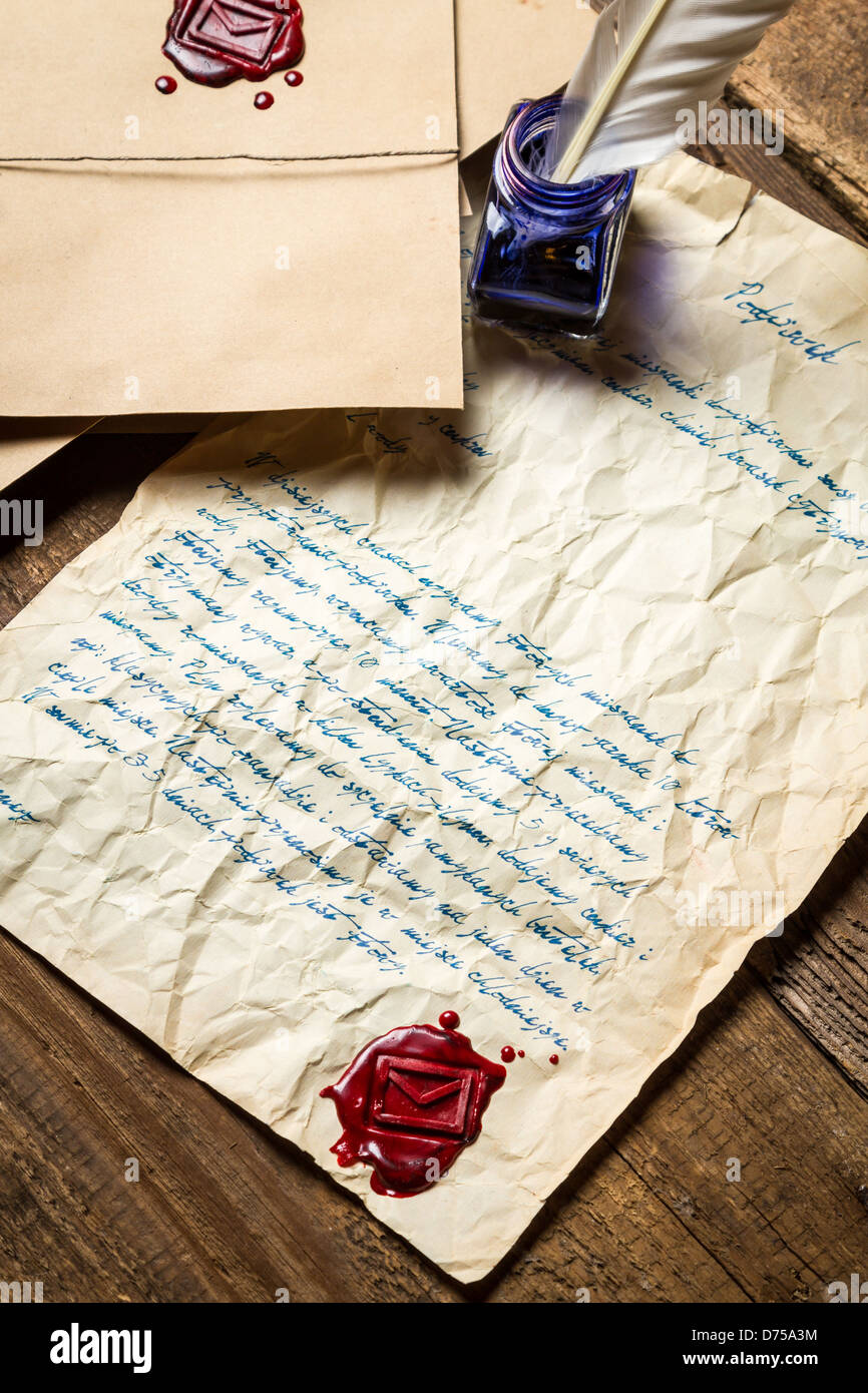 Old letter sealed with red sealant and written in blue ink Stock Photo ...