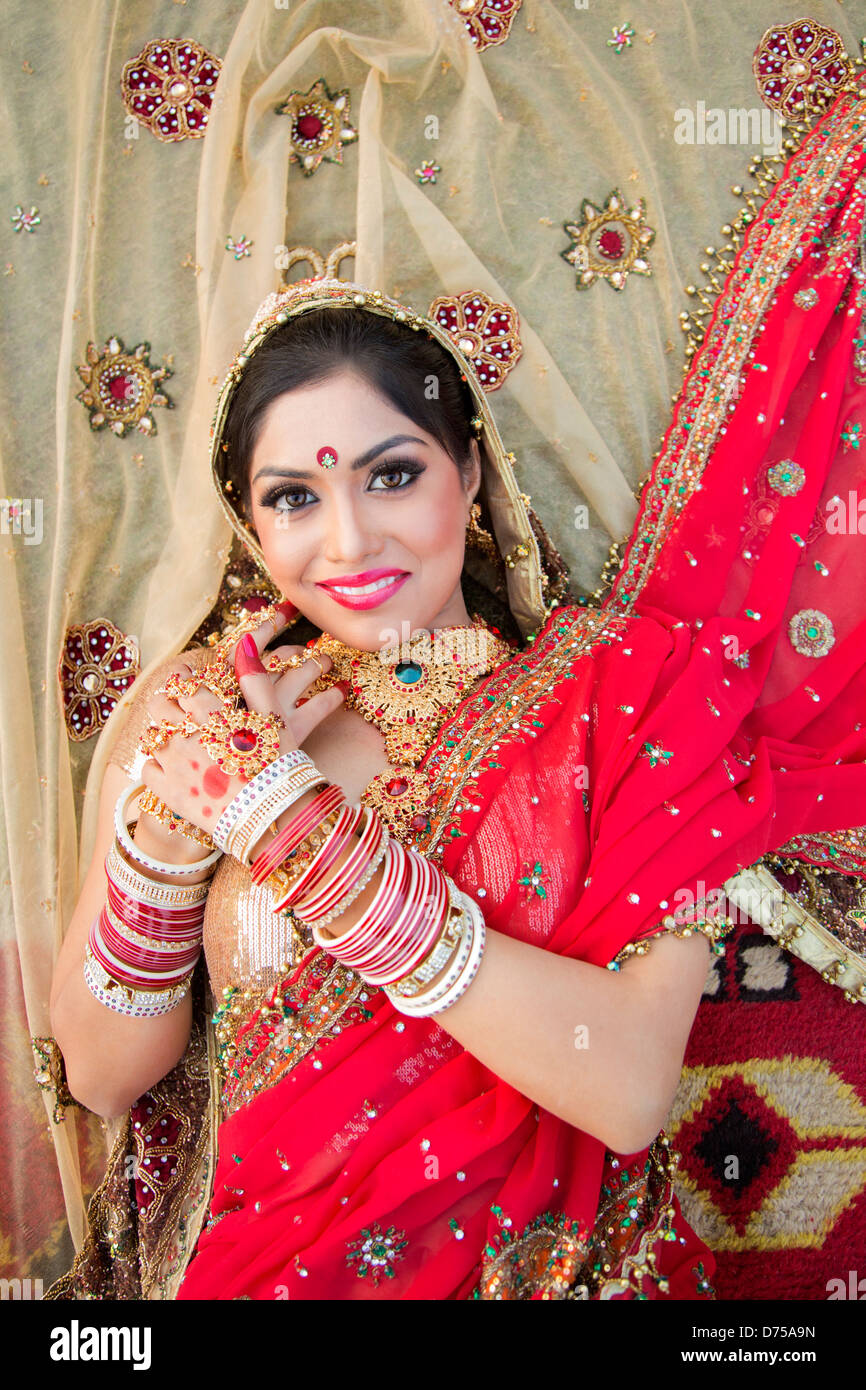 Beautiful Indian bride in traditional wedding dress and posing Stock ...