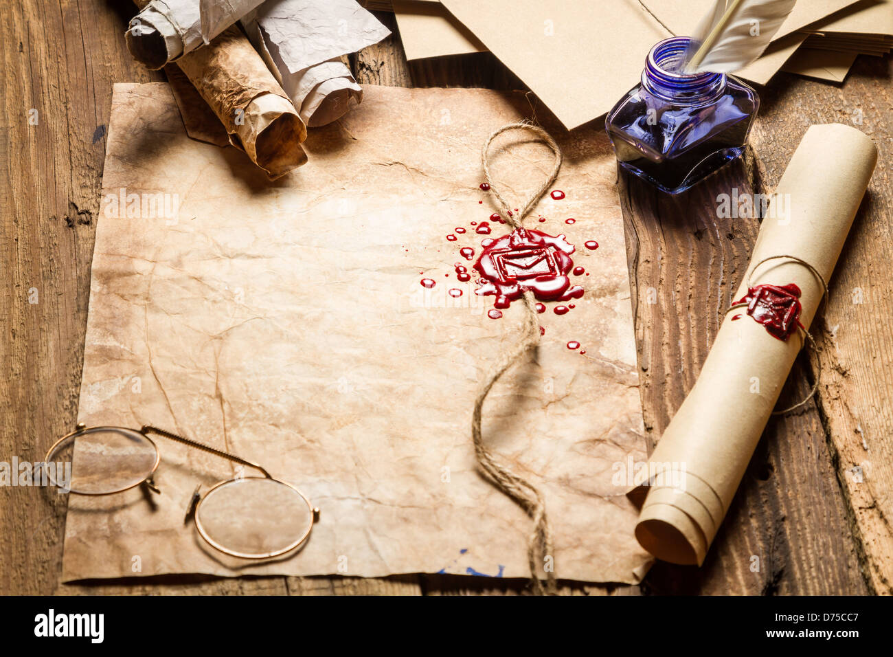 Old scrolls with red sealant, glasses and blue ink in the inkwell Stock ...