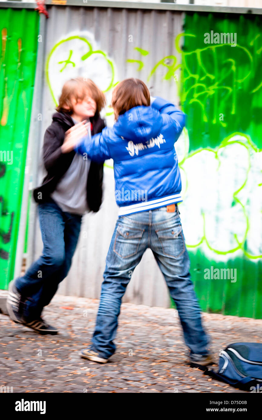 Fight between young boys Stock Photo - Alamy