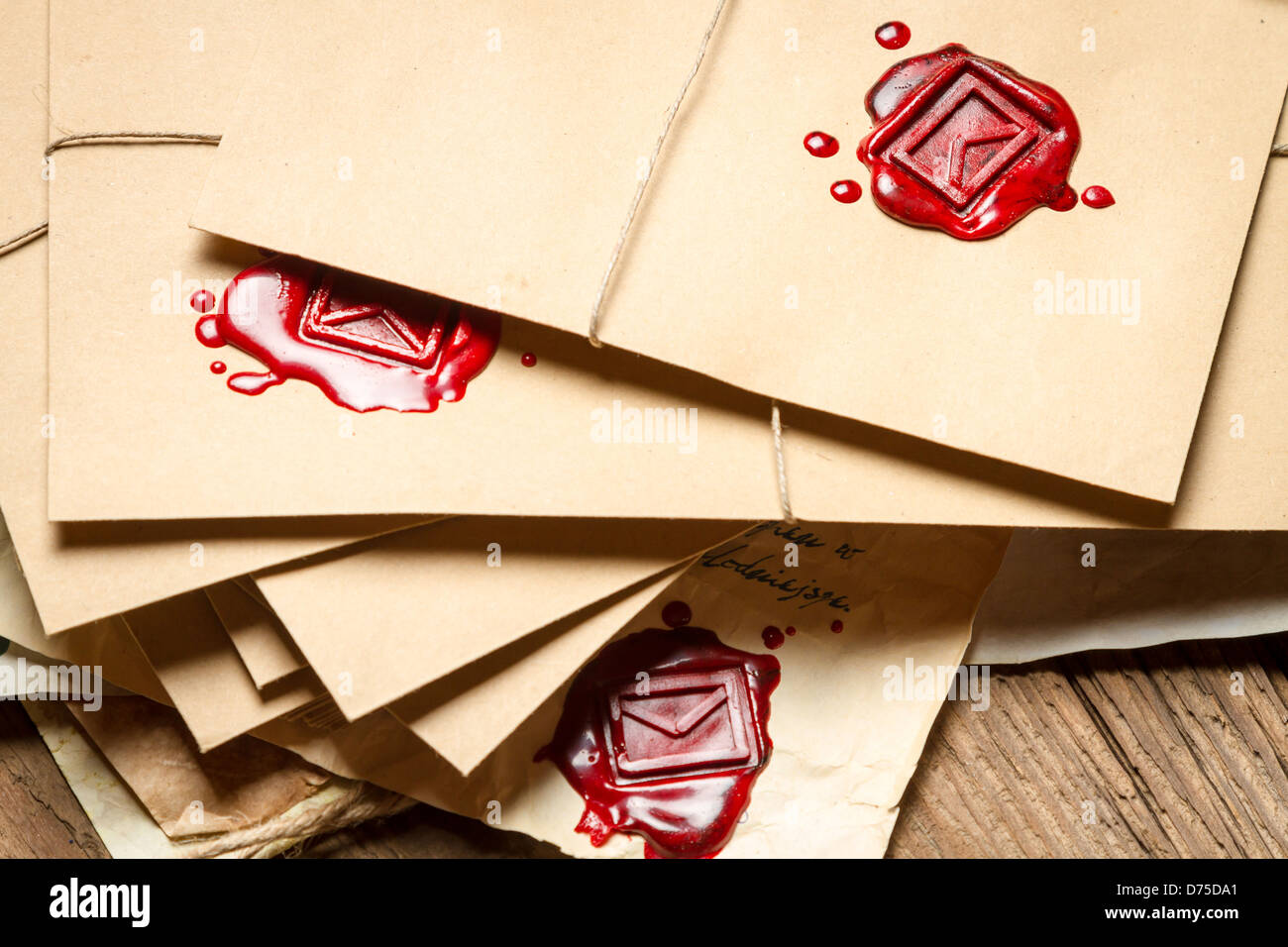 Stack of vintage envelopes with red sealant Stock Photo - Alamy