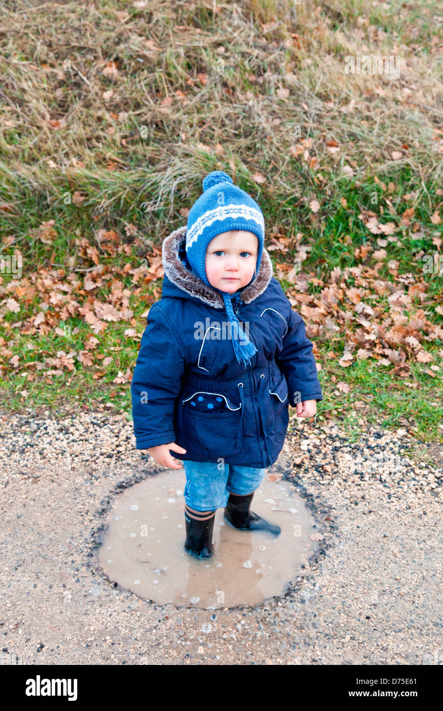6 year old child puddle hi-res stock photography and images - Alamy