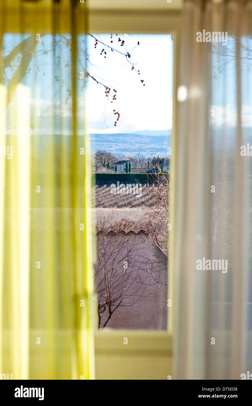 Landscape through a window Stock Photo - Alamy