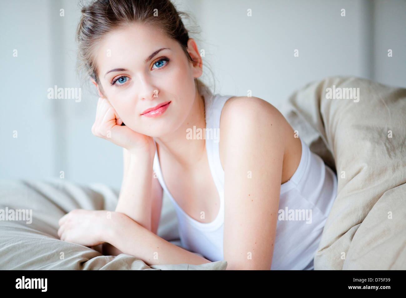 woman resting in bed Stock Photo - Alamy