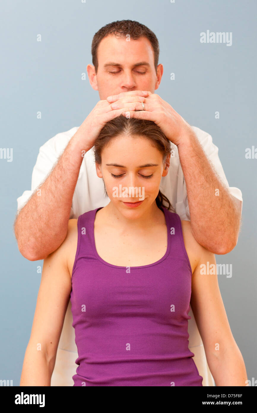 Structural osteopathy session, treatment of back pain by running tissue ...
