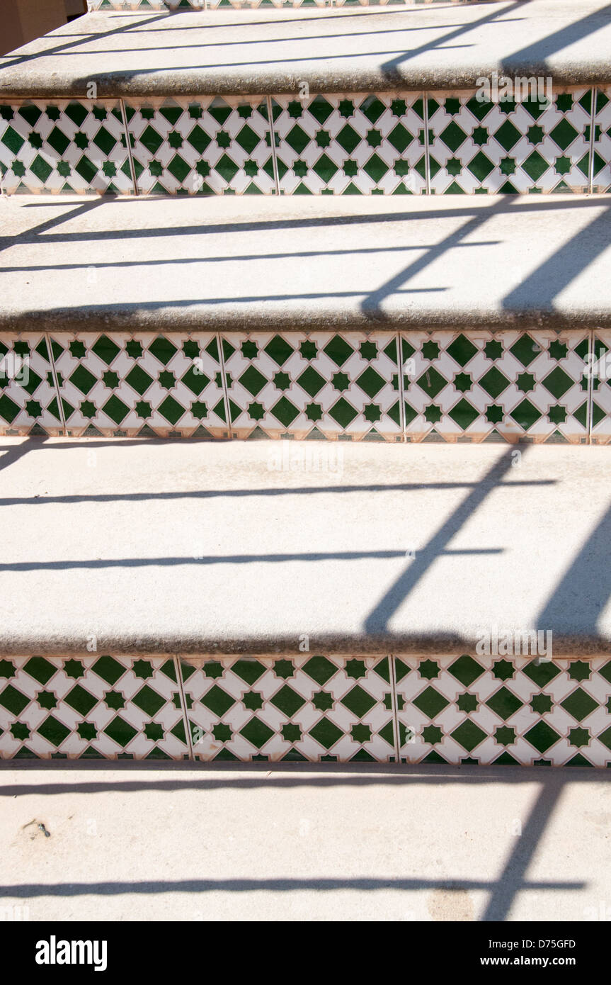 Closeup of typically Spanish stairs with shadow pattern Stock Photo - Alamy