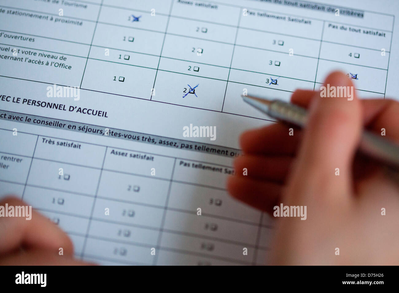 woman filling questionnaire Stock Photo - Alamy