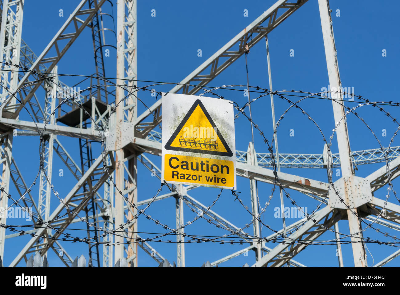 Razor Wire Fence Warning Sign Stock Photos & Razor Wire Fence Warning ...