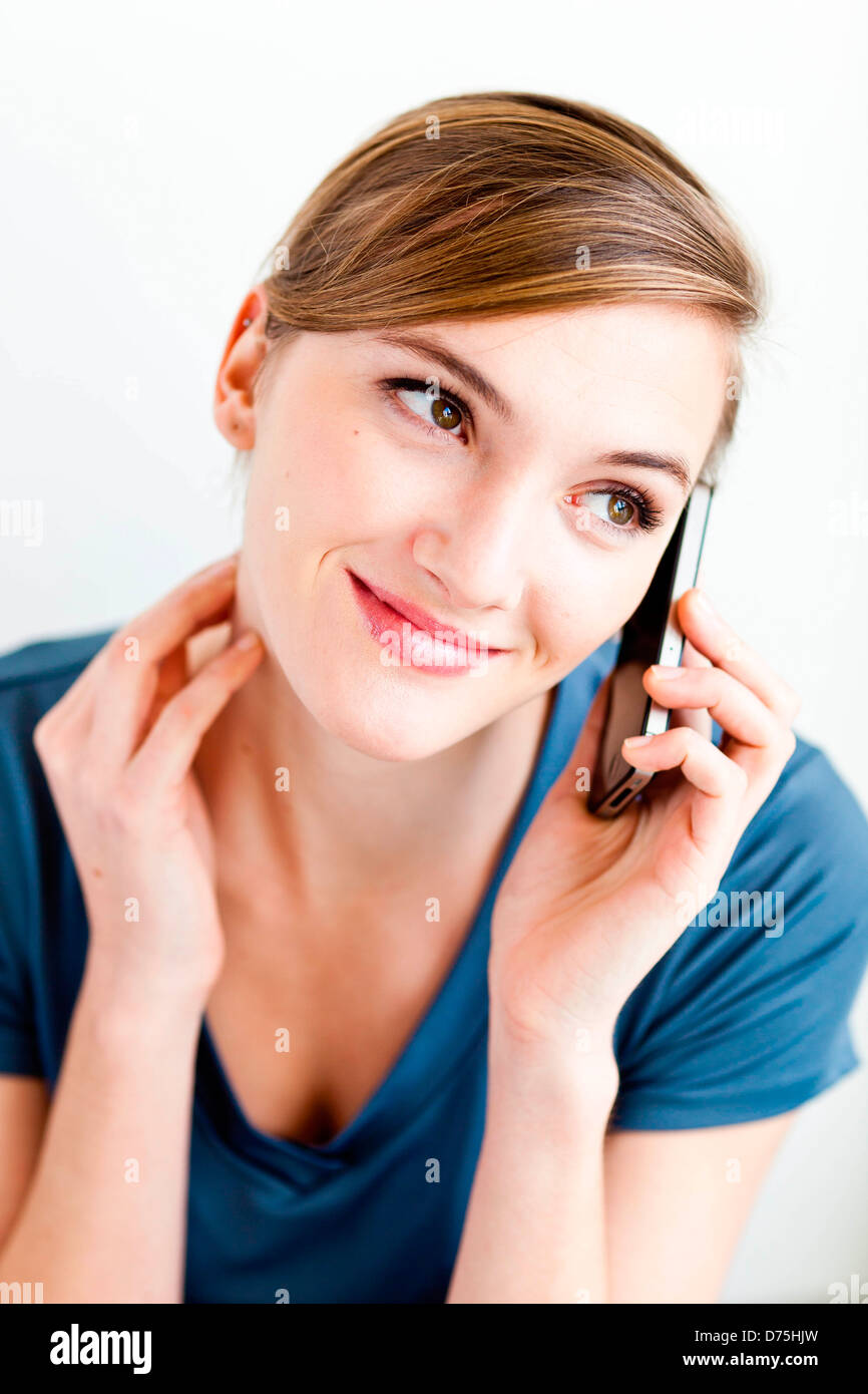 woman touching the screen of an iphone Stock Photo - Alamy