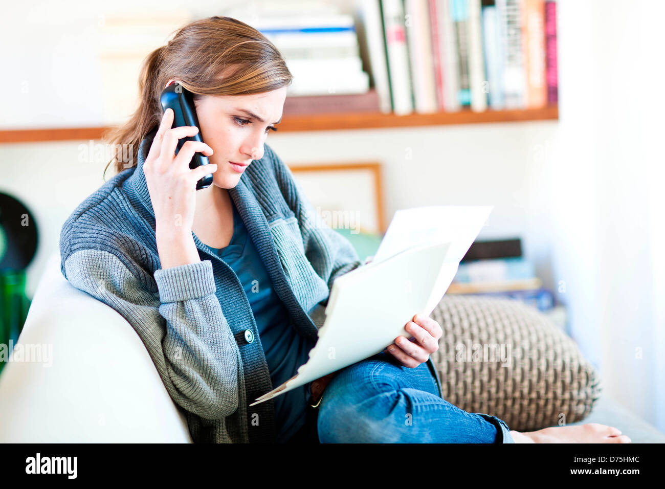 woman with administrative papers Stock Photo - Alamy