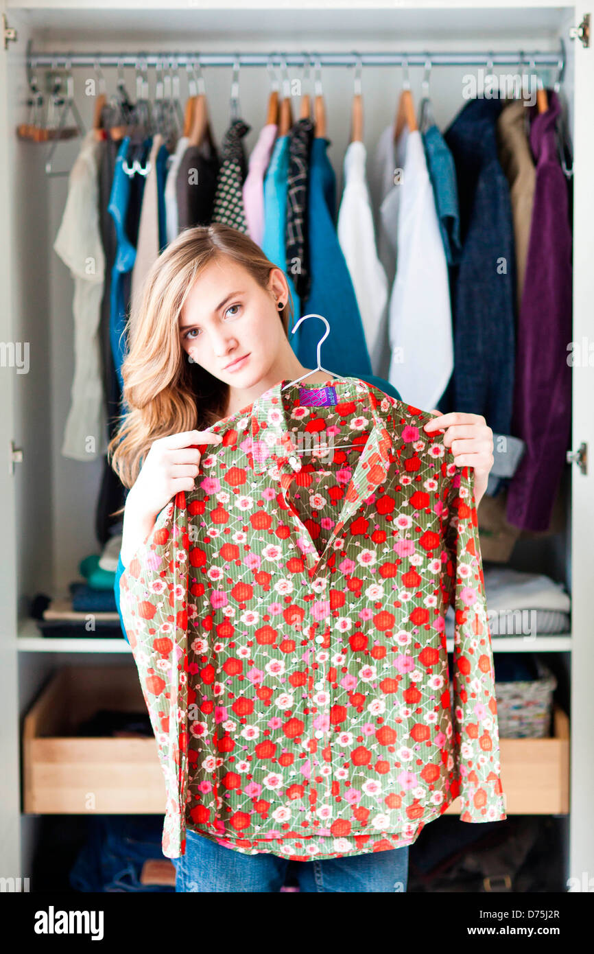 woman choosing clothes Stock Photo - Alamy