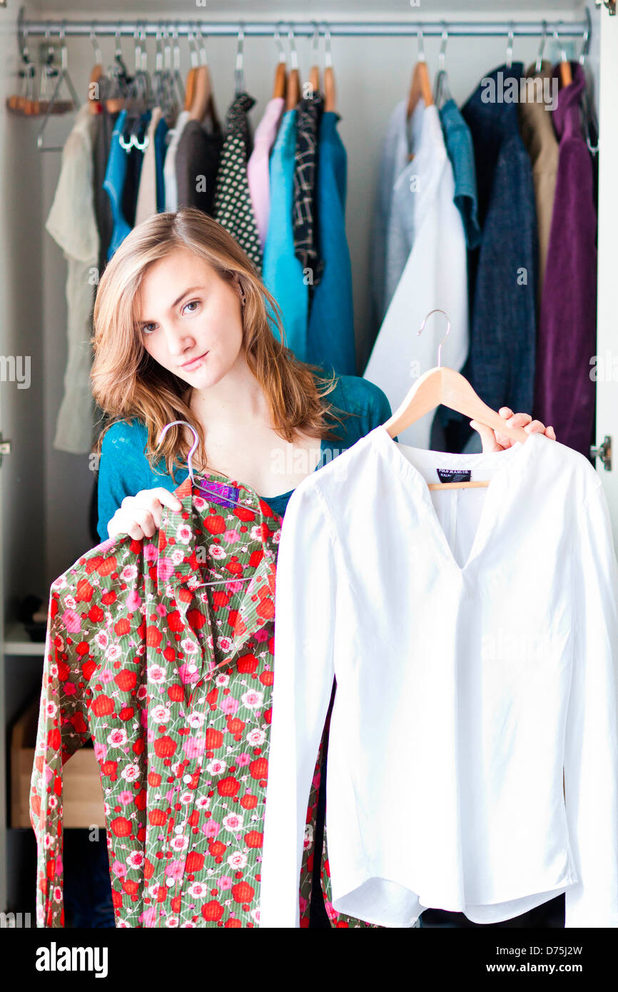 woman choosing clothes Stock Photo - Alamy