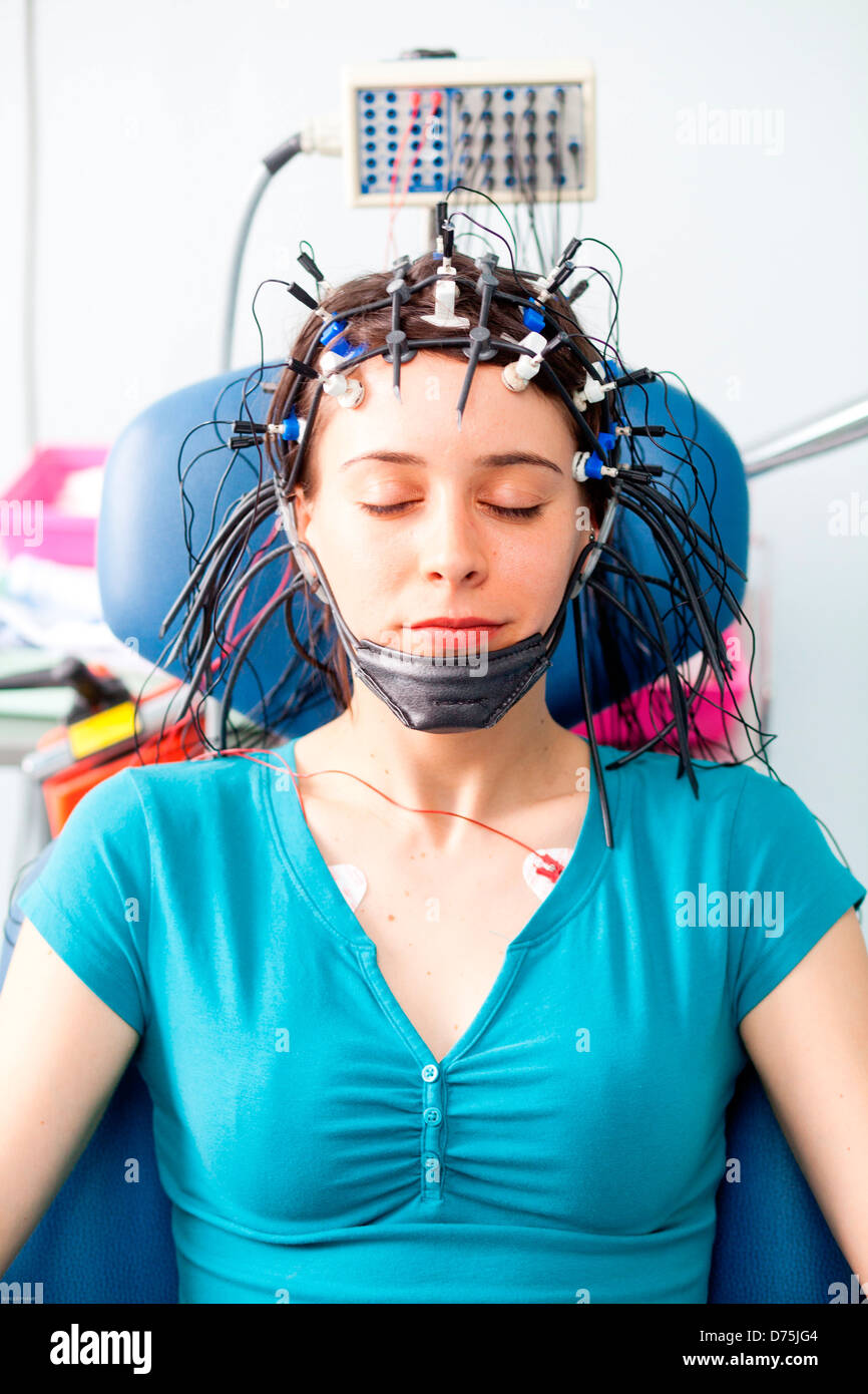 woman undergoing an electroencephalogram (EEG). Limoges hospital ...