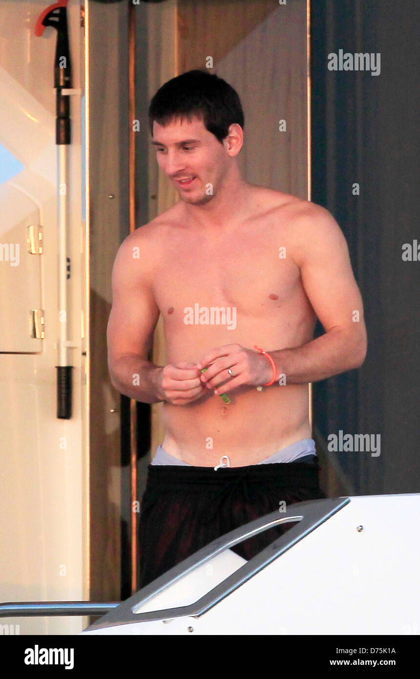 FC Barcelona footballer Lionel Messi is seen aboard a yacht enjoying ...