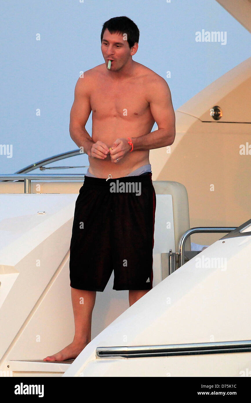 FC Barcelona footballer Lionel Messi is seen aboard a yacht enjoying ...