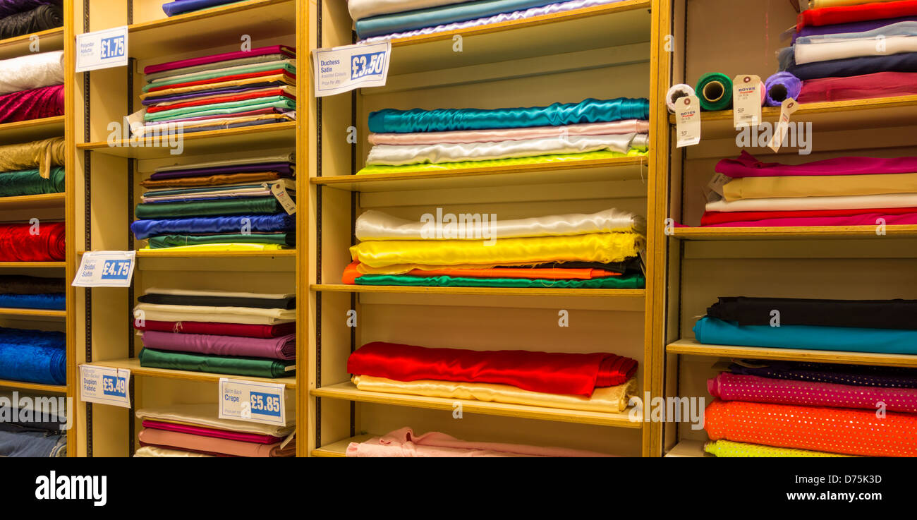 Colourful material on display in shop Stock Photo - Alamy