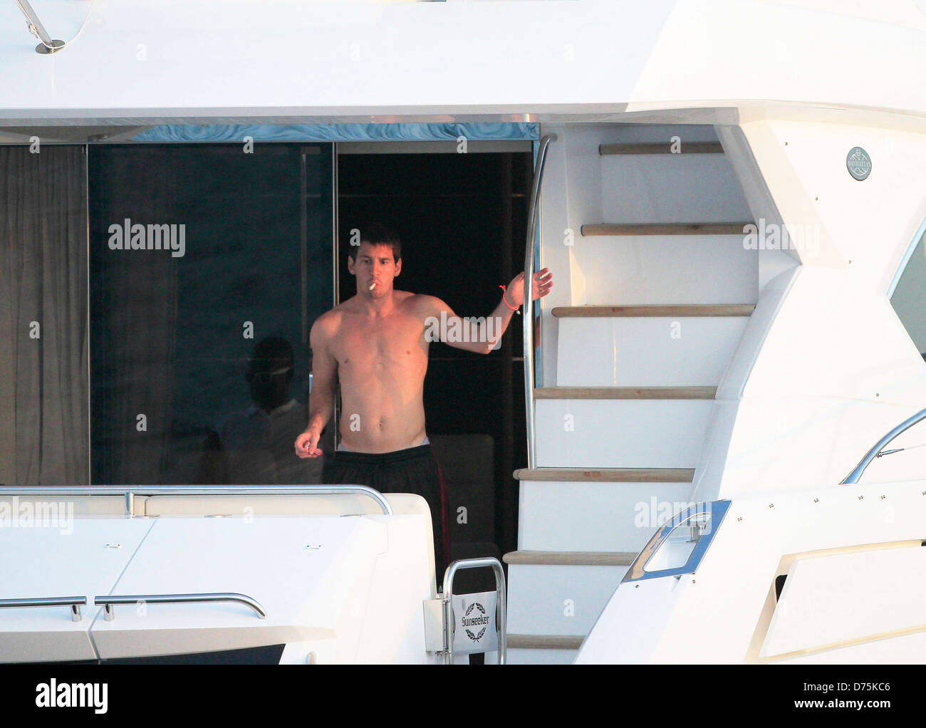 FC Barcelona footballer Lionel Messi is seen aboard a yacht enjoying ...
