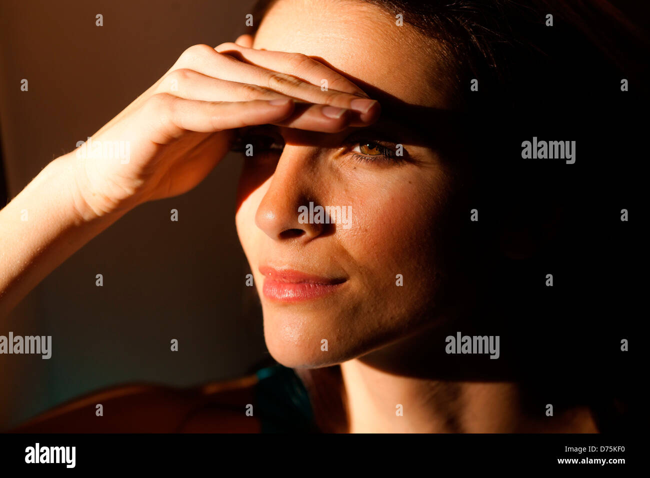 Woman dazzled sun hi-res stock photography and images - Alamy
