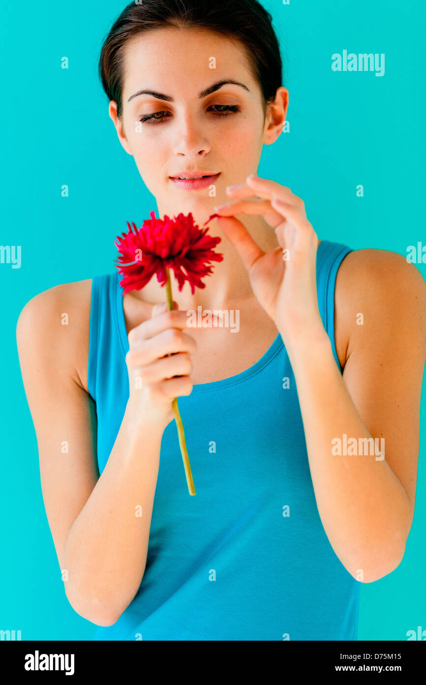 woman plucking a flower Stock Photo - Alamy