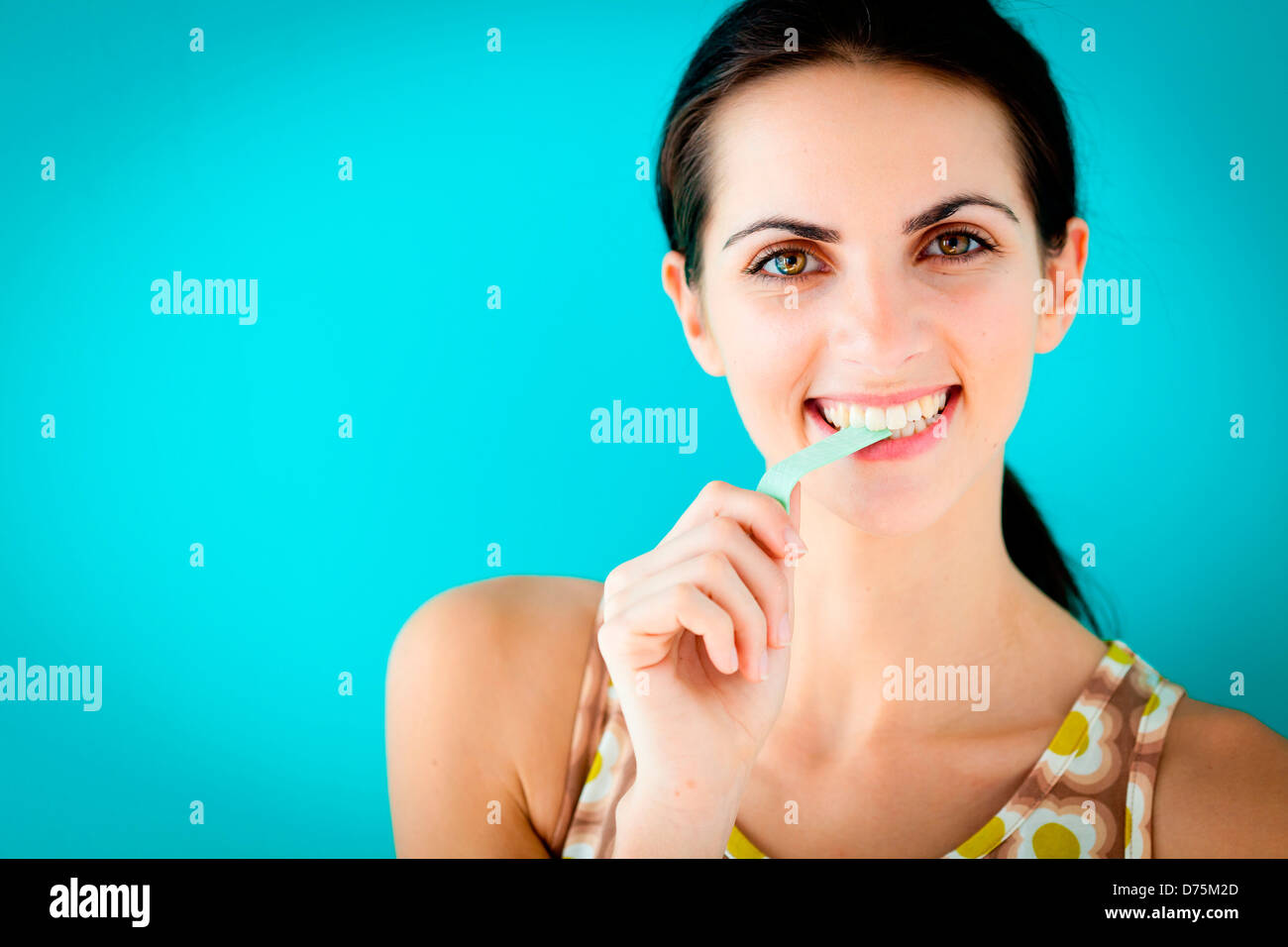 Woman eating chewing gum hi-res stock photography and images - Alamy