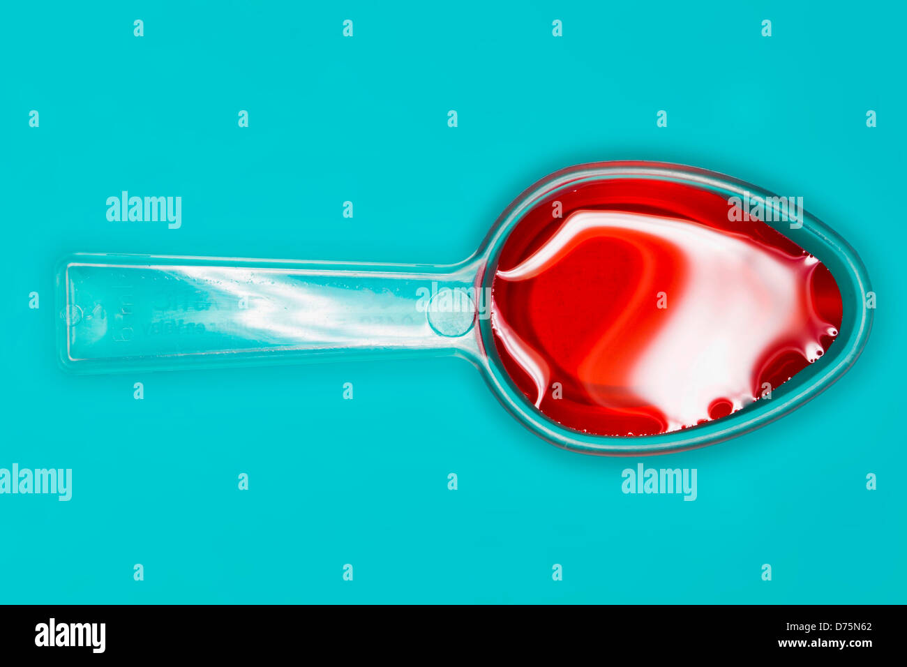 Spoonful of syrup Stock Photo - Alamy