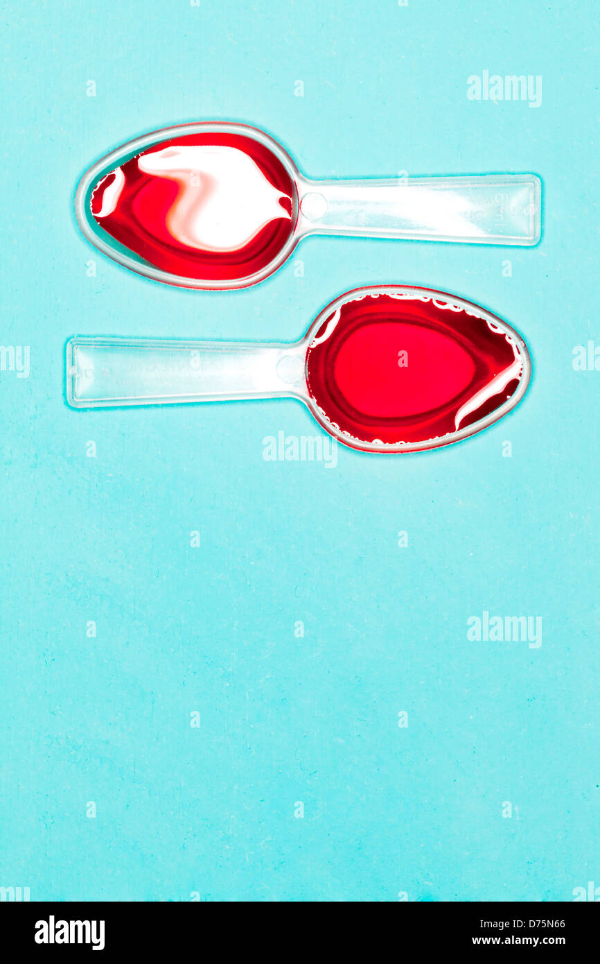 Spoonful of syrup Stock Photo - Alamy