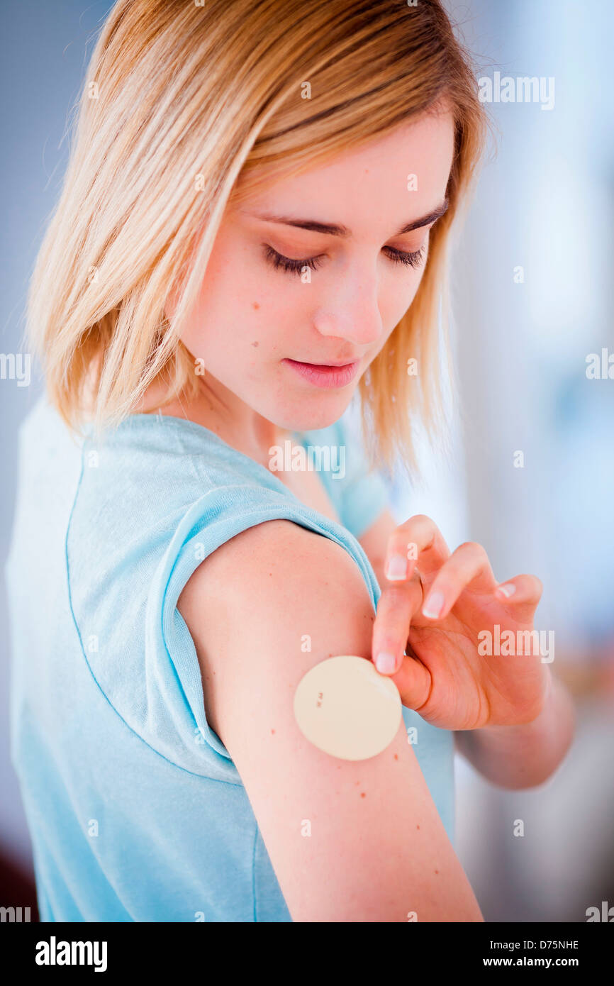 Woman with a patch Stock Photo - Alamy