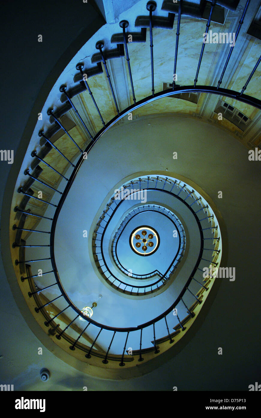 Infinity stairs. Round and twisting colorful stairs. What goes around ...