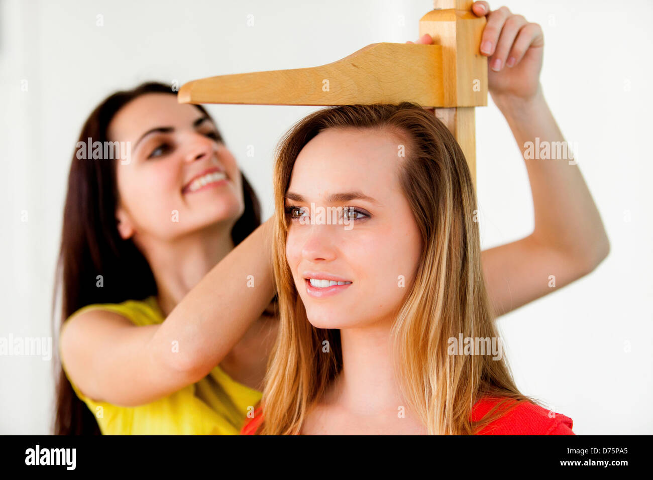 Woman under height gauge hi-res stock photography and images - Alamy