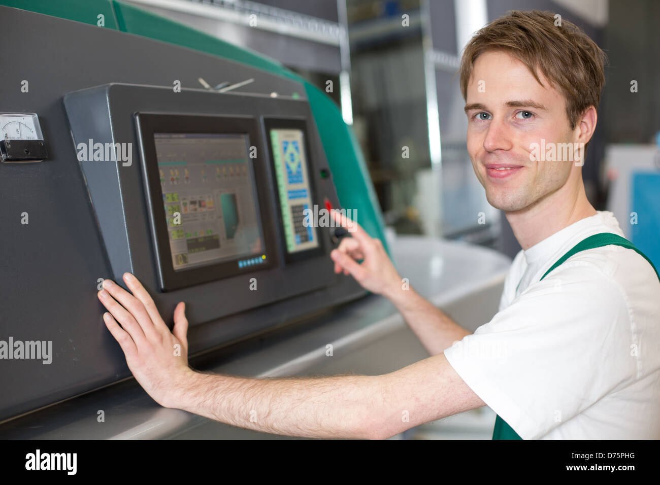 Man operating grinder in workshop hi-res stock photography and images ...