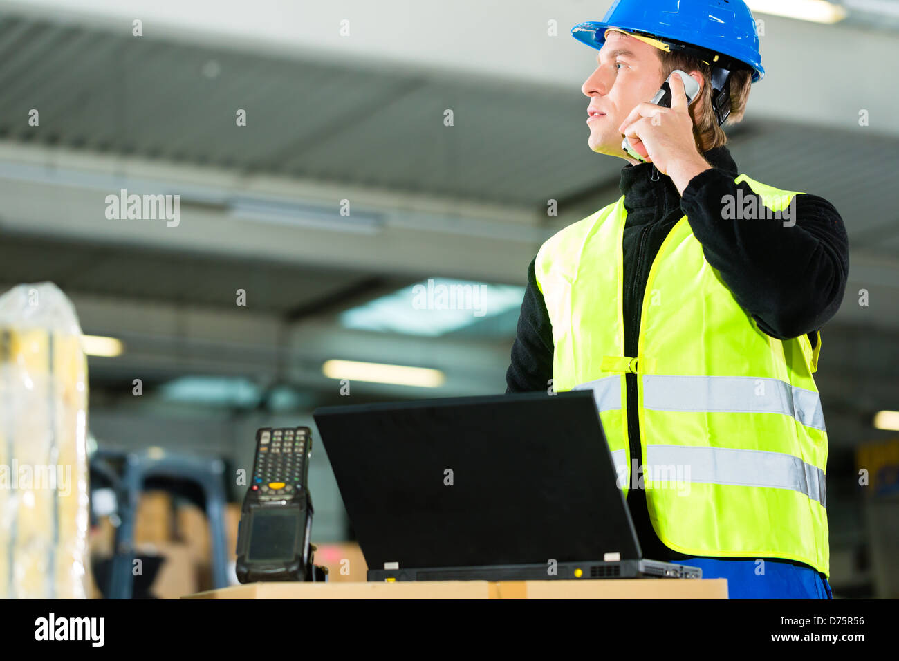 Warehouse worker using scanner on hi-res stock photography and images ...