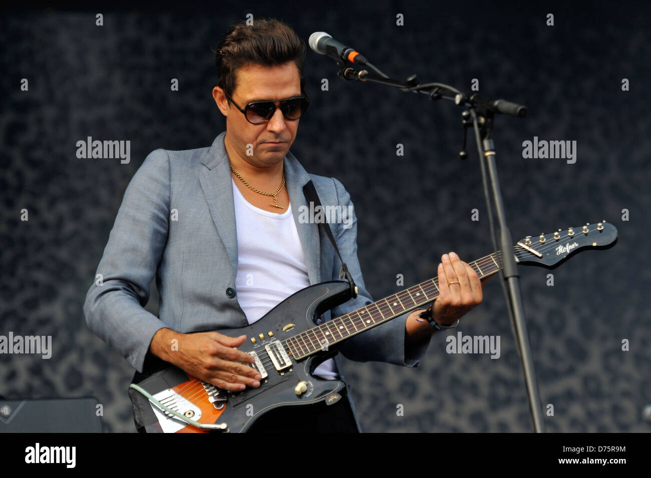 Jamie Hince of The Kills, with his wedding band visible on his left ...