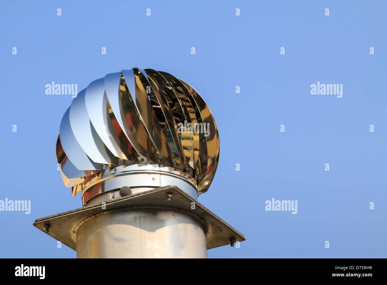 A chrome wind measurement tool on blue sky Stock Photo - Alamy