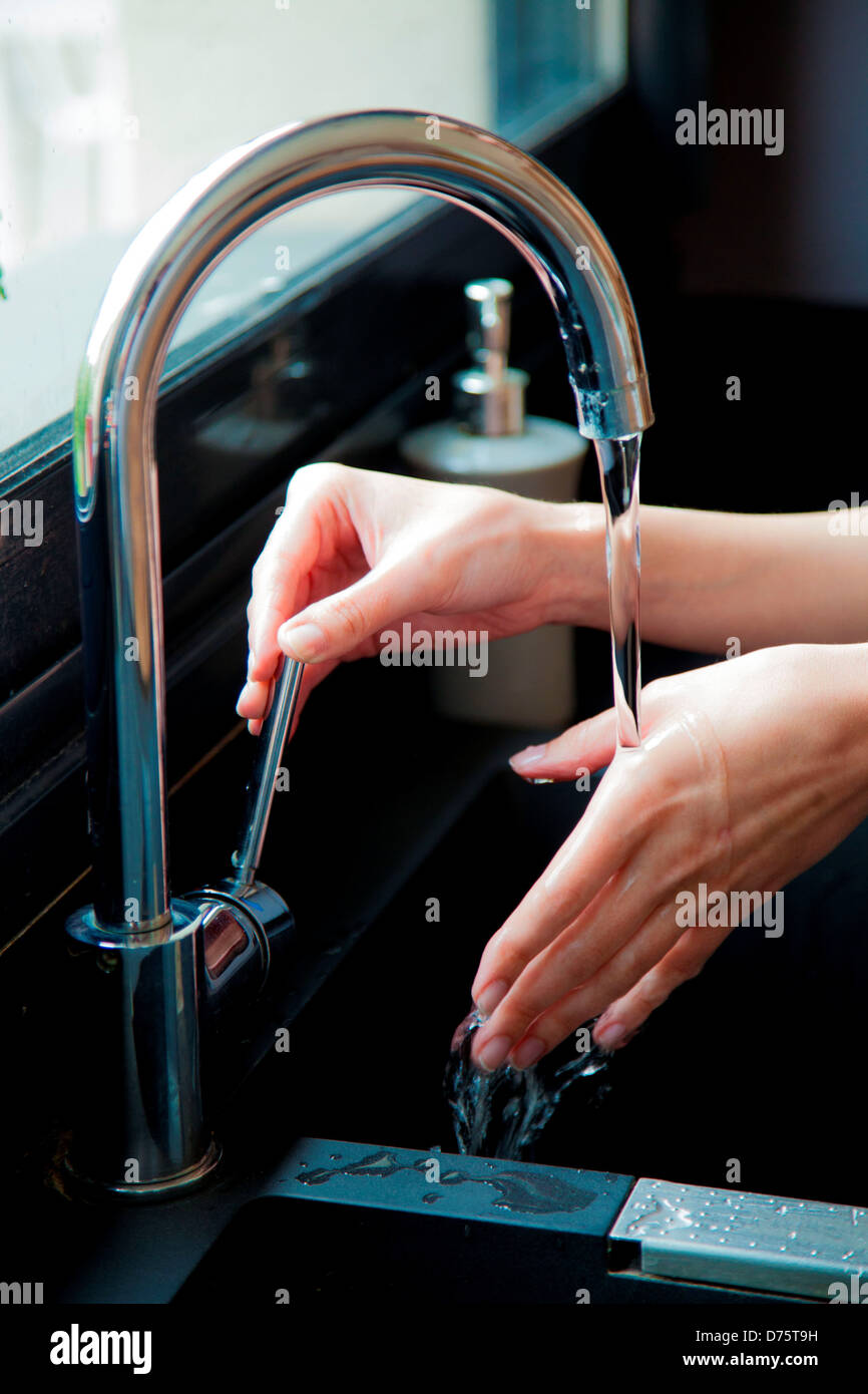 Burned Hand Under Running Water