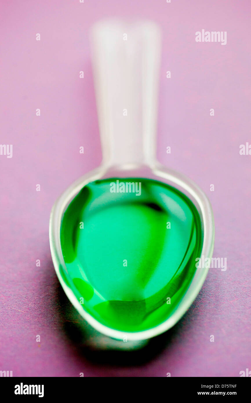 Spoonful of syrup Stock Photo - Alamy