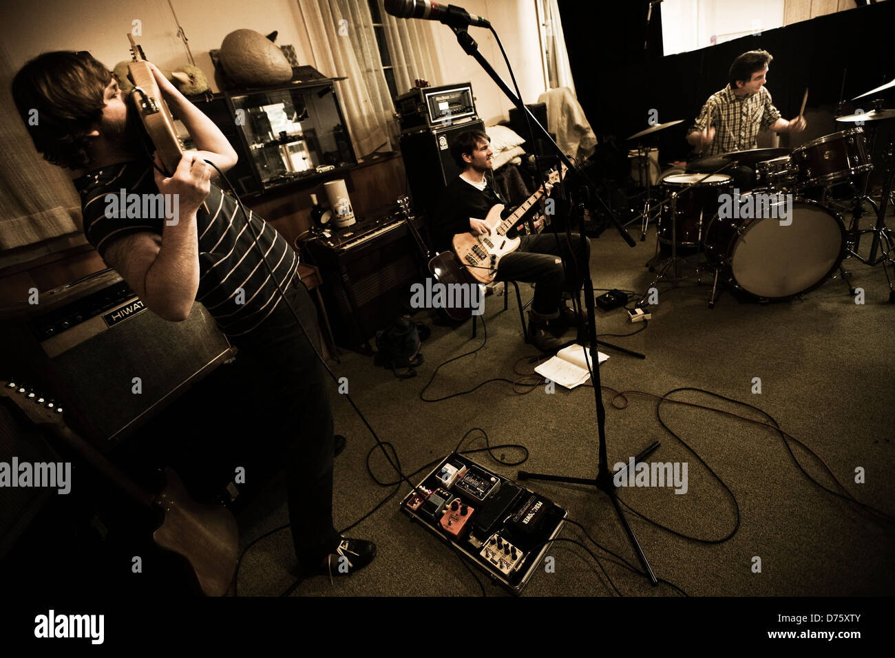 Luke Buda playing guitar with his tongue during Phoenix Foundation ...