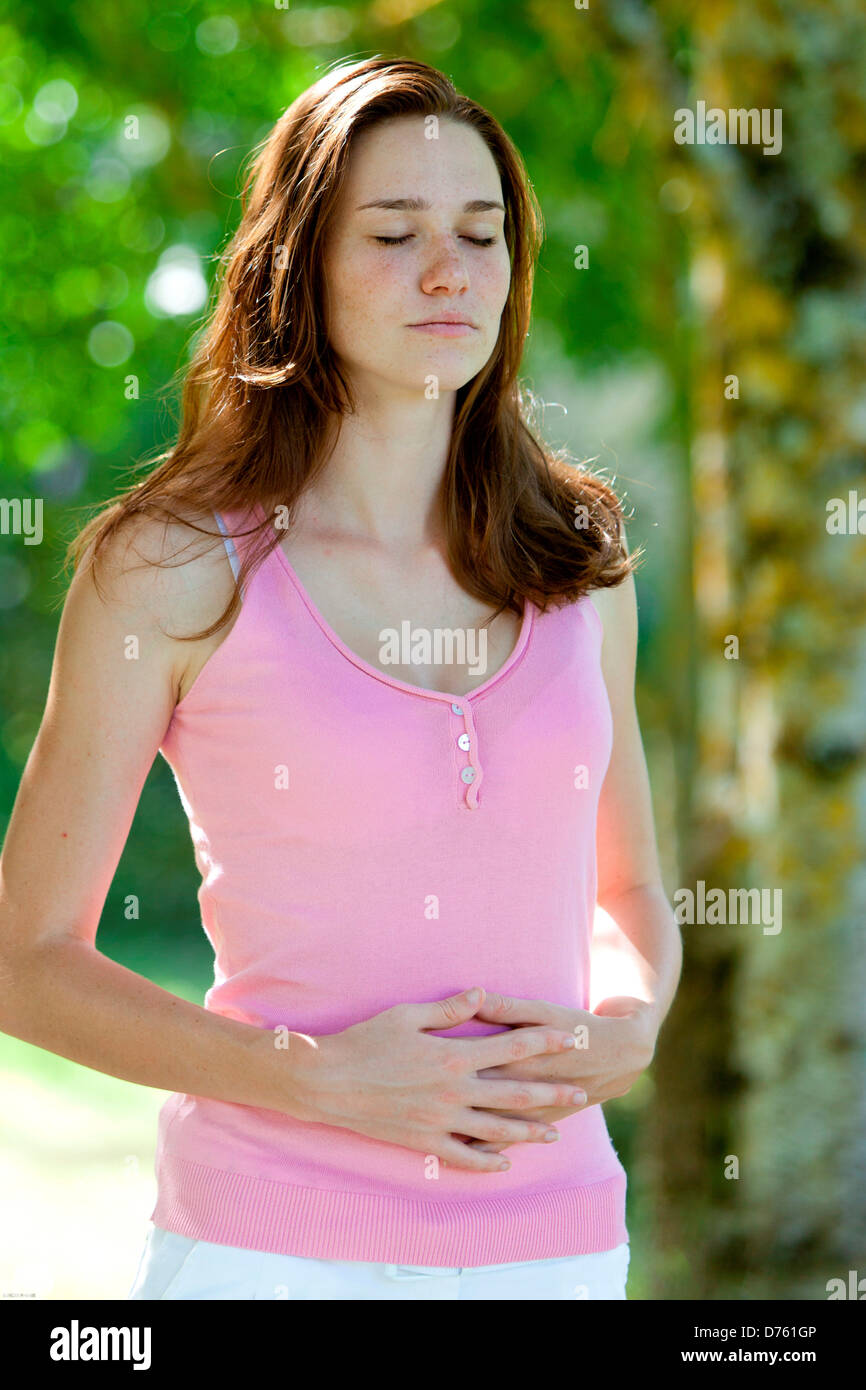 Woman breathing in nature Stock Photo - Alamy