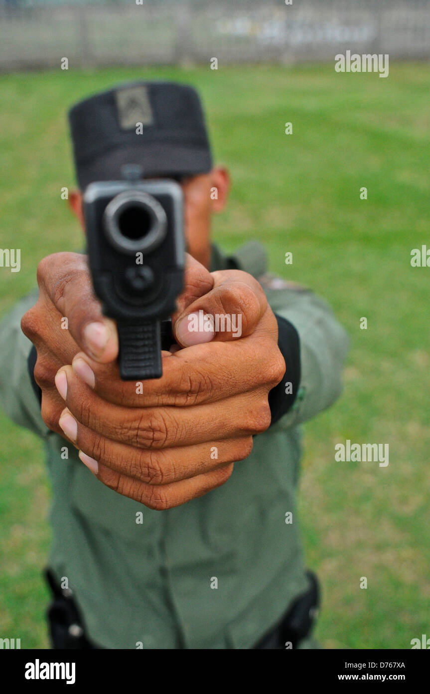 Uniformed police officer at a tactical and firearms training course at ...