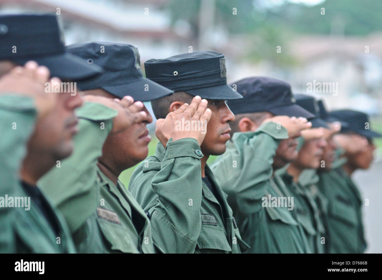 Uniformed officers saluting, Panamanian National Police forces, Panama ...