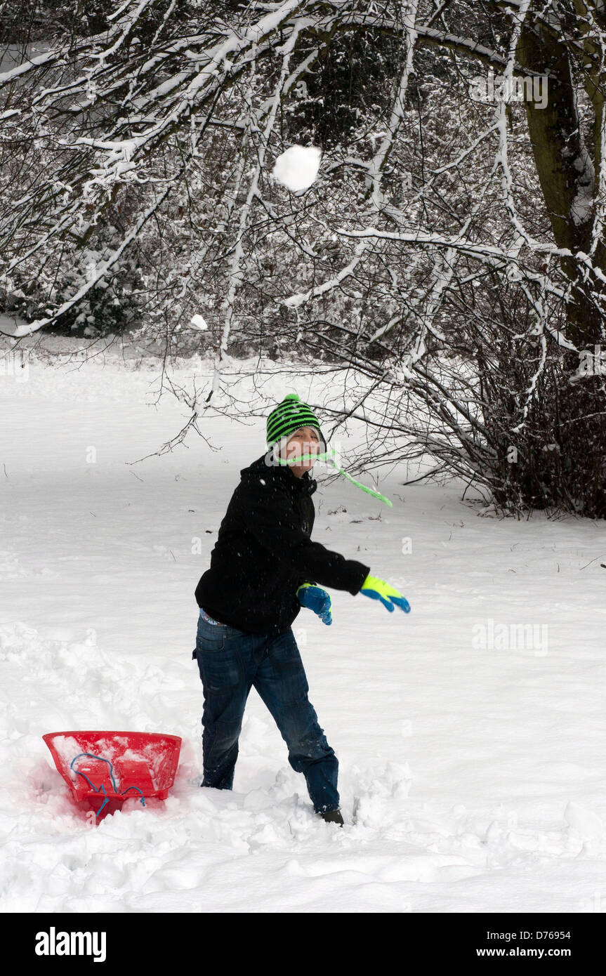 A young boy throwing a snowball The countries capital and surrounding ...