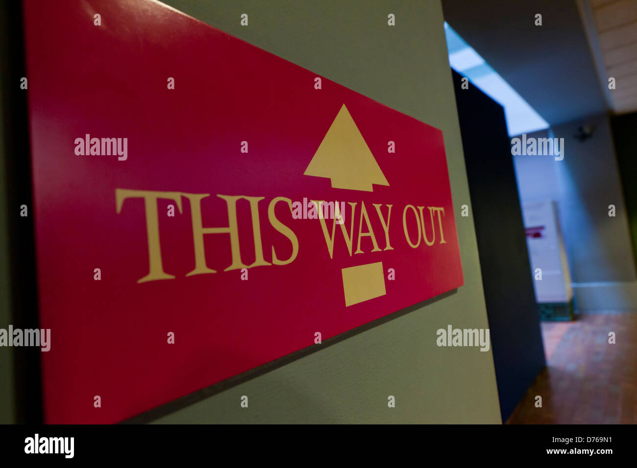"This Way Out" exit sign Stock Photo - Alamy