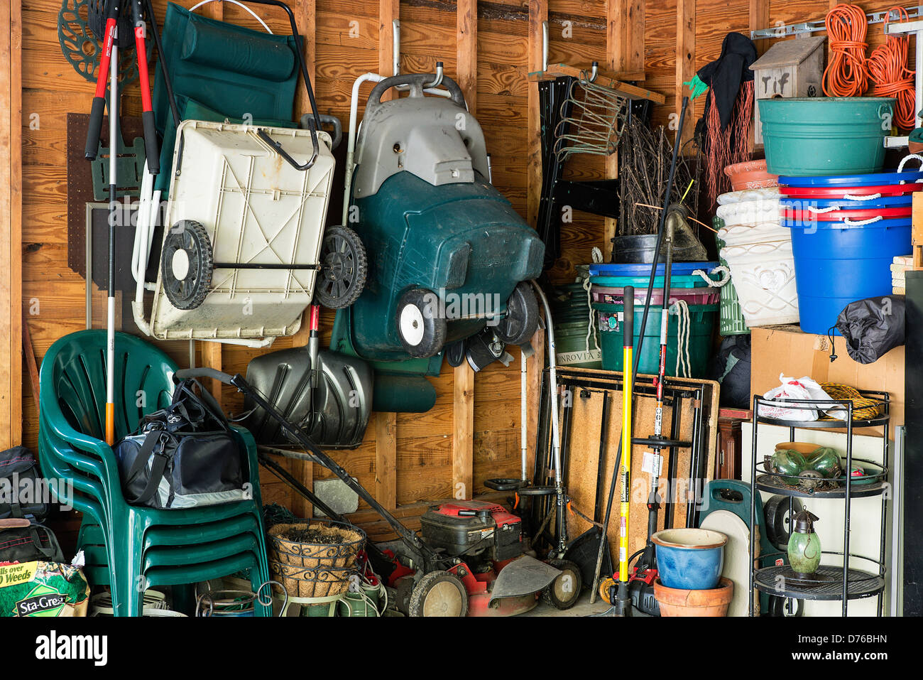 Cluttered interior garage storage Stock Photo - Alamy