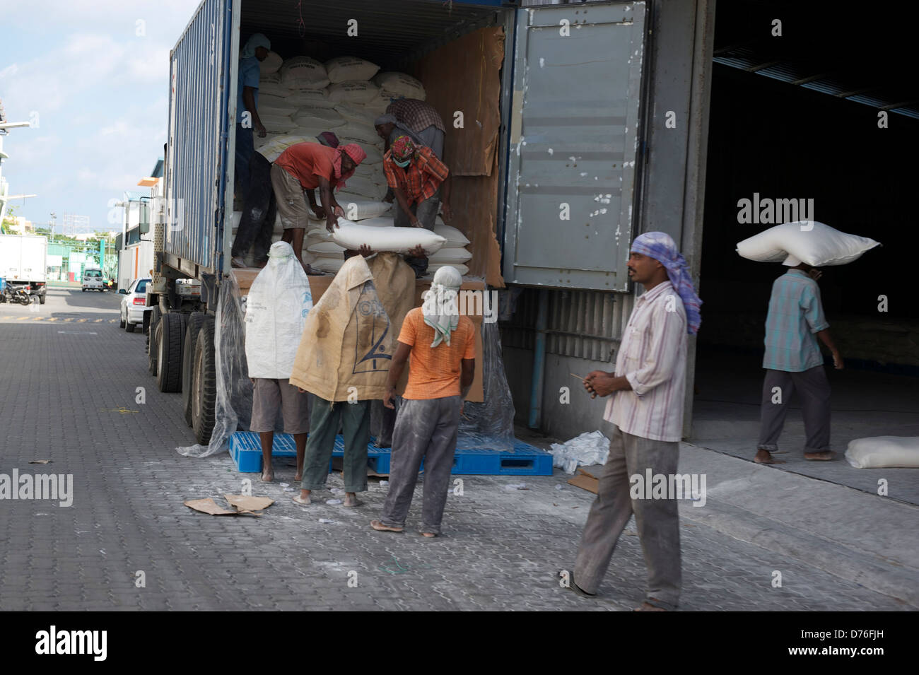 working hard in male maldives Stock Photo - Alamy