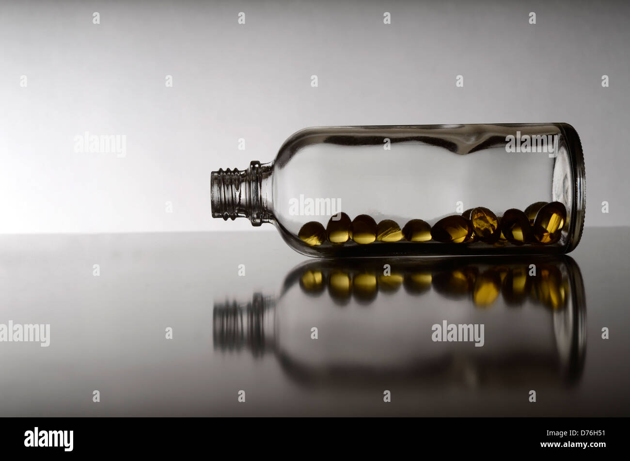 Golden capsules hi-res stock photography and images - Alamy