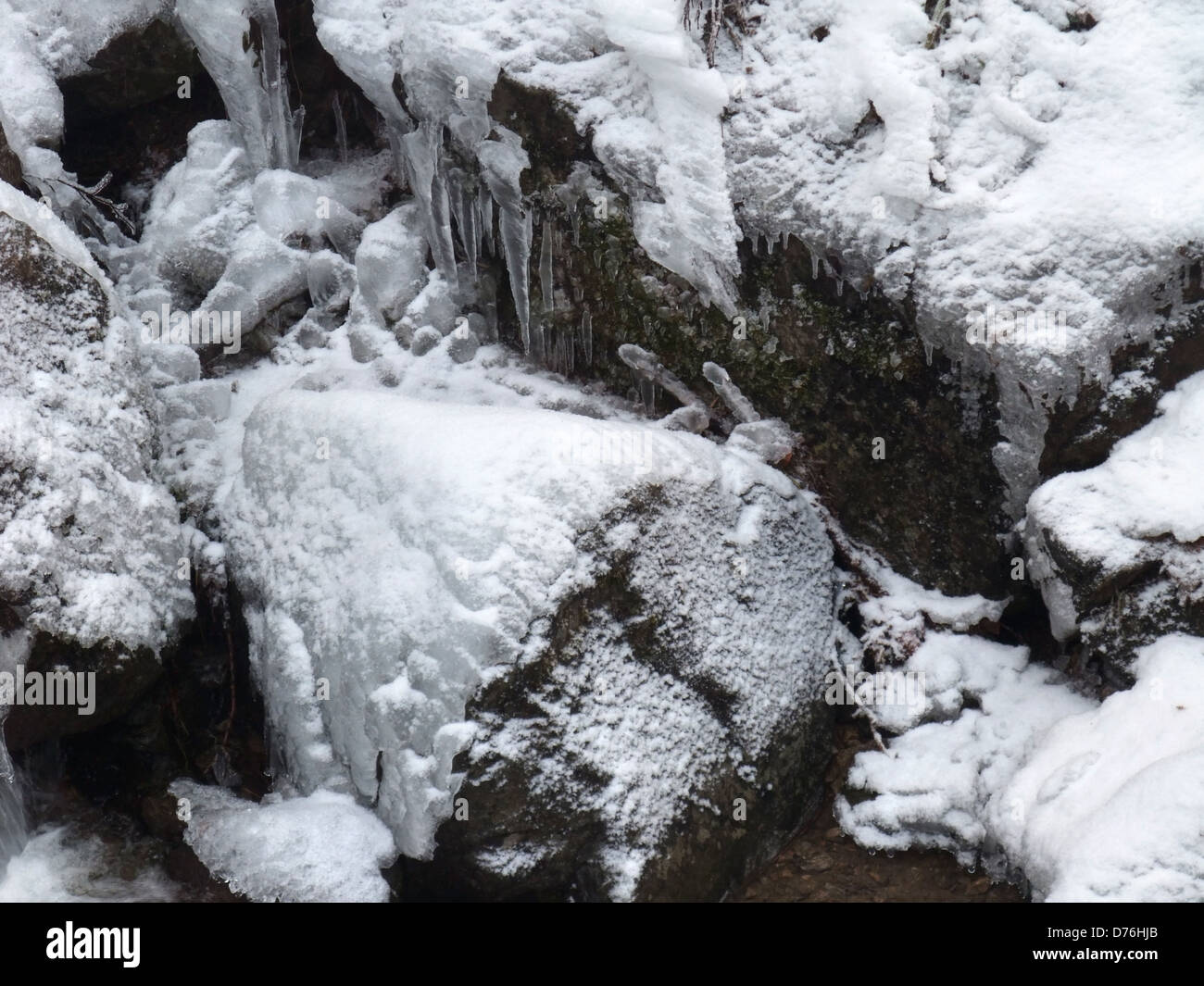 full frame winter background with snow, stones and ice Stock Photo - Alamy