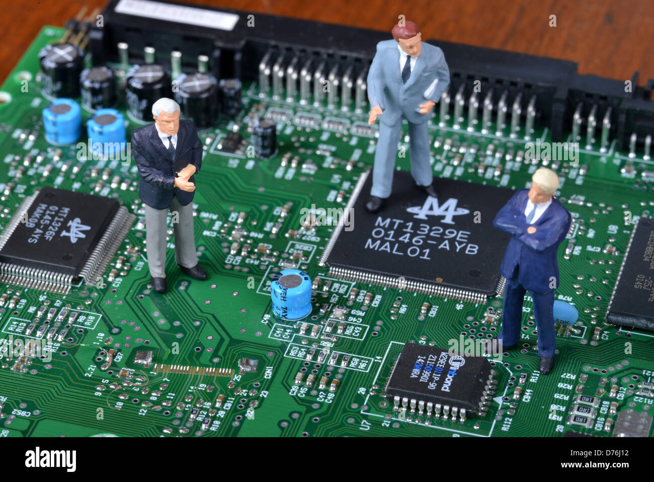 Electronics to platinum leading record Businessmen Stock Photo - Alamy