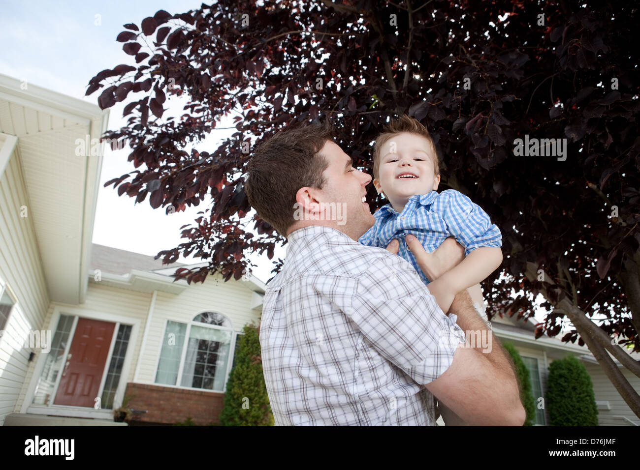 Father and Son Playing Outdoors Stock Photo - Alamy Father and Son Playing Outdoors Stock Photo - Alamy